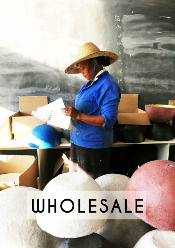 Quazi Design – Hand made jewellry made from recycled magazines