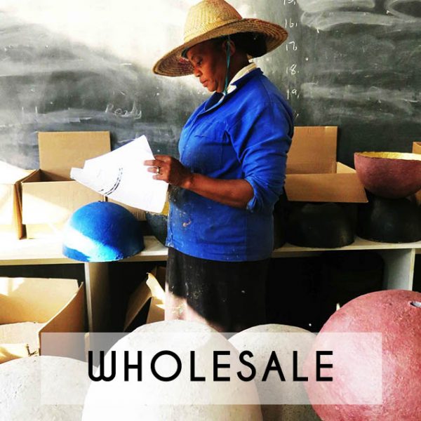 Quazi Design – Hand made jewellry made from recycled magazines