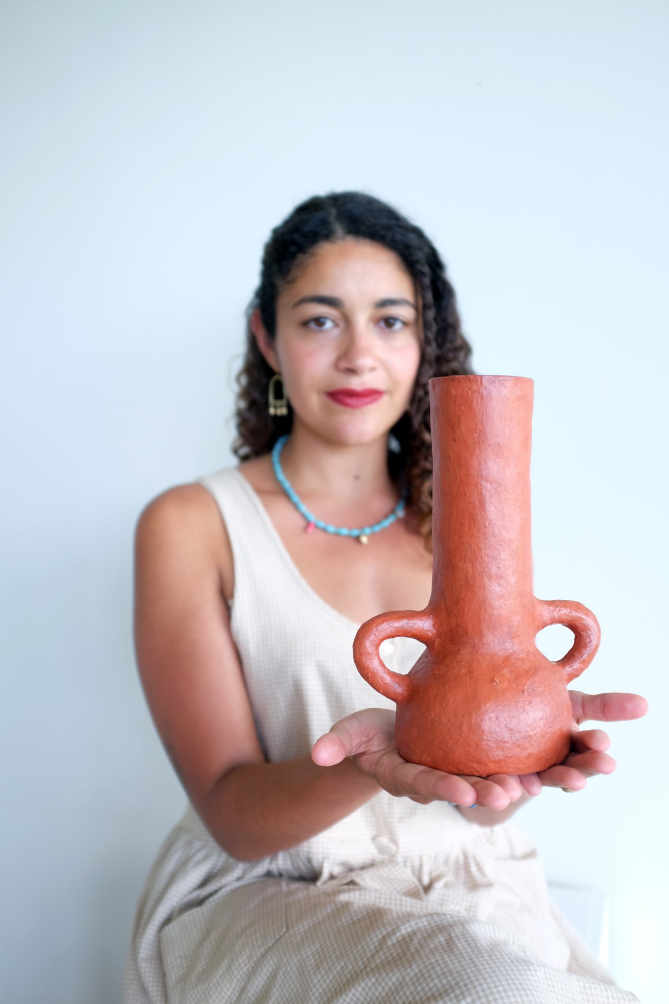 Quazi Design – Hand made jewellry made from recycled magazines